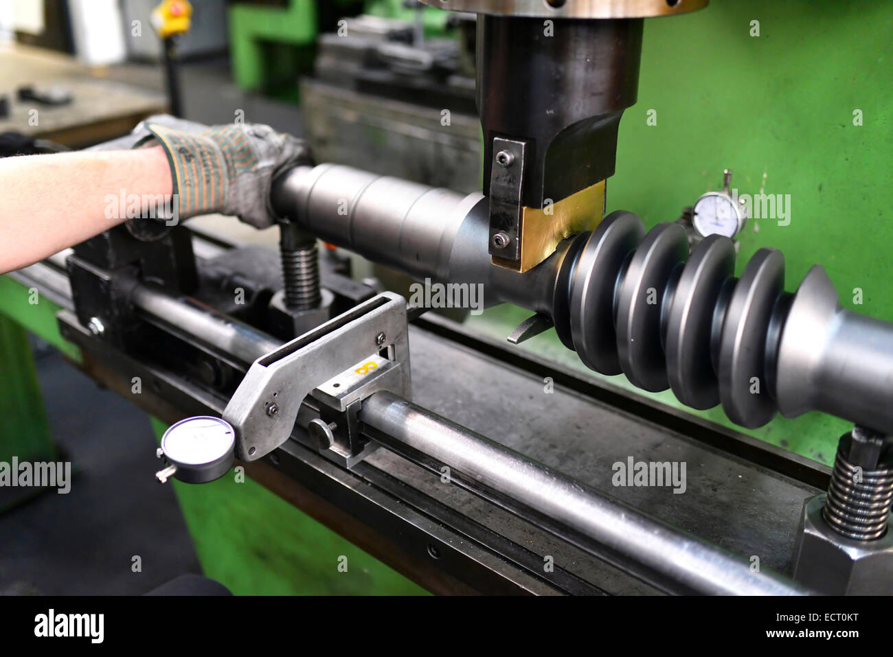 Quality check of an engineering shaft in a hardening shop Stock Photo ...