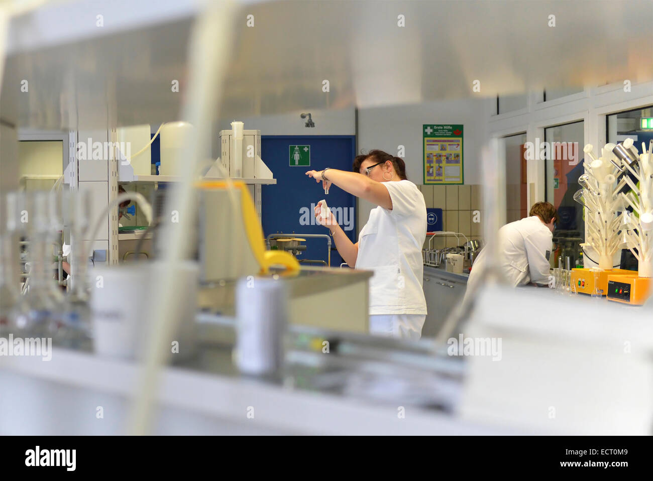 Lab technicians examining products of a sugar mill Stock Photo - Alamy