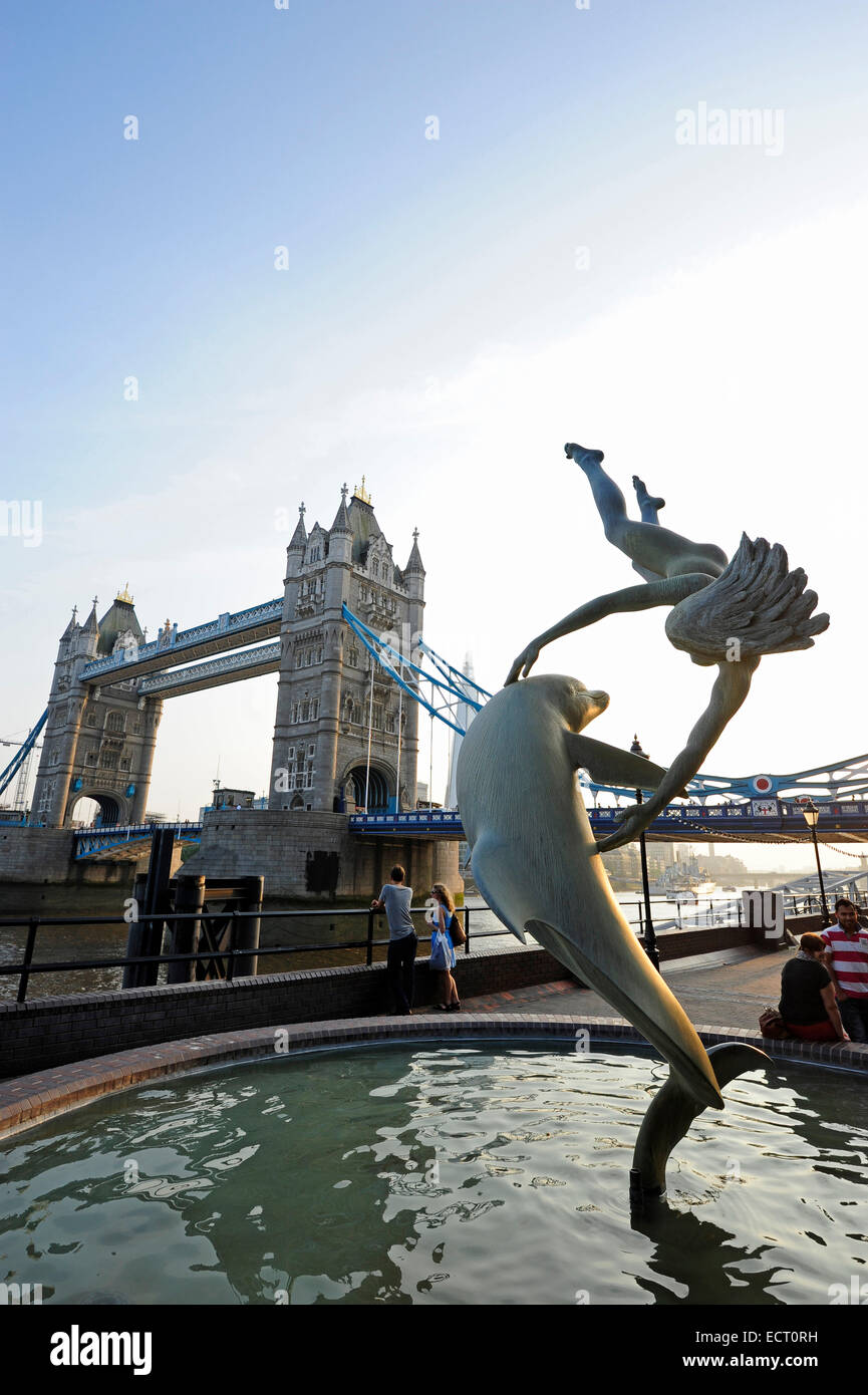 UK London Tower Bridge and Girl with a Dolphin Fountain Stock Photo - Alamy