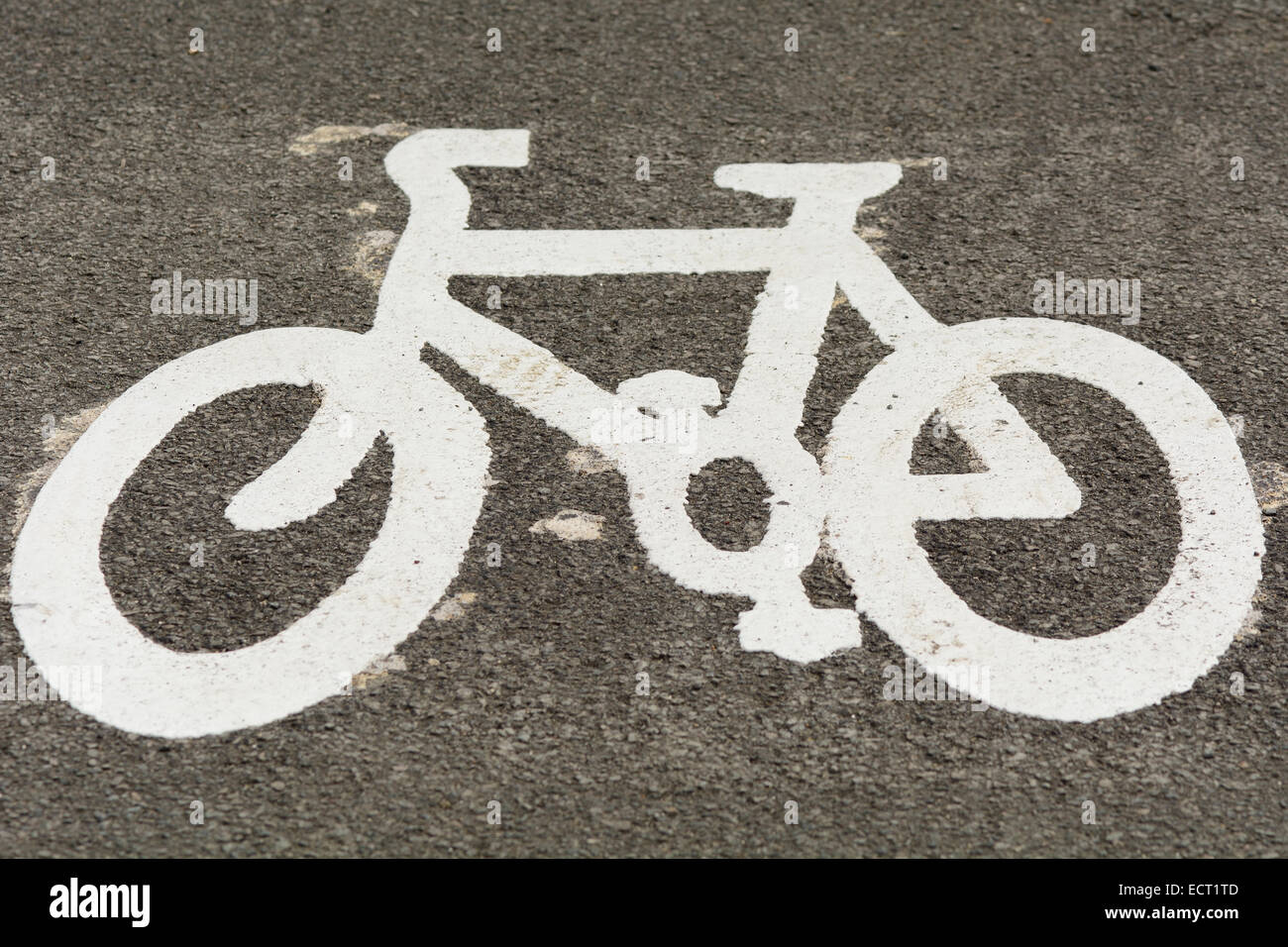 Cycle lane symbol on pavement Stock Photo - Alamy