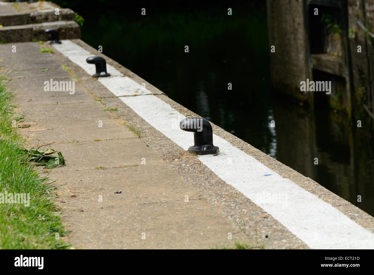 Boat mooring posts at canal lock in Bedford, England Stock Photo - Alamy