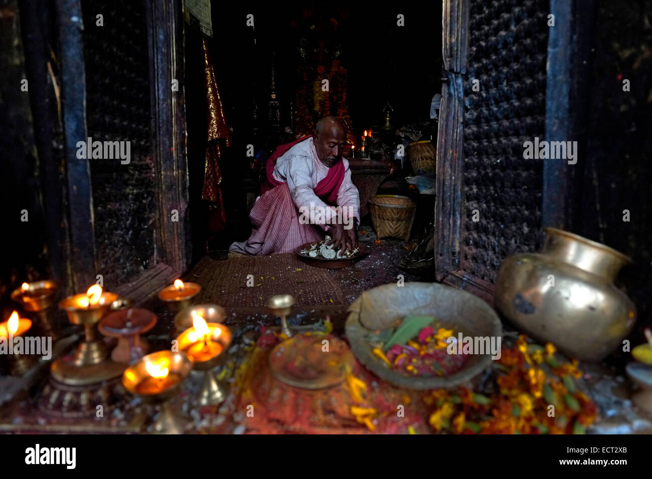 A Buddhist priest inside Rato Machhendranath Temple the patron god of ...