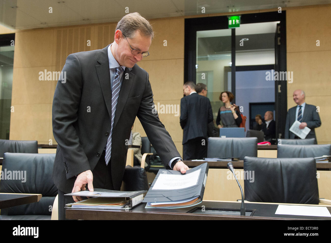 Berlin, Germany. 19th Dec, 2014. Berlin's governing mayor Michael Mueller (SPD) arrives at a ...