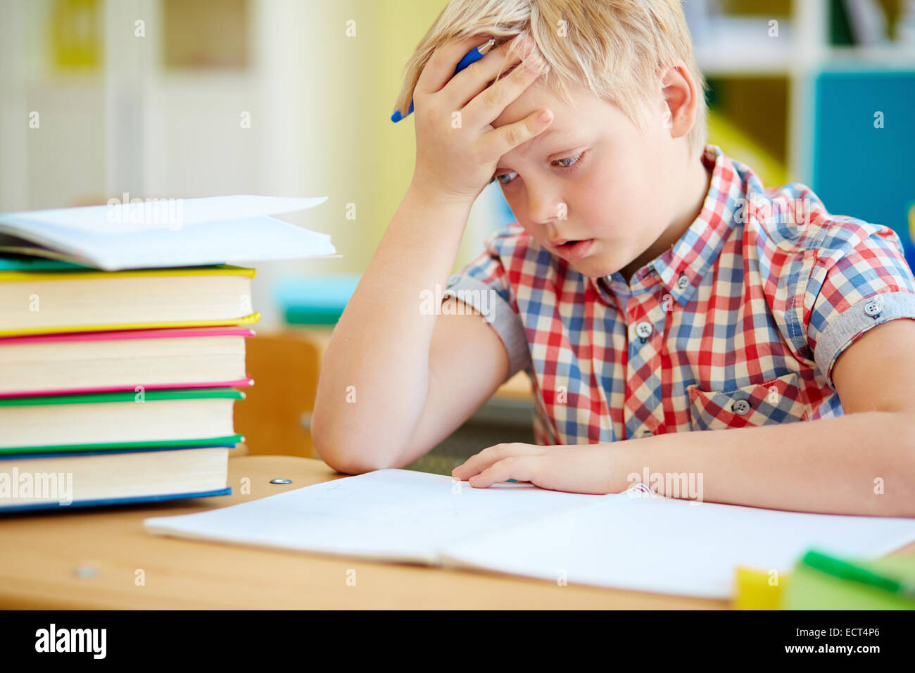 Boy concentrating hi-res stock photography and images - Alamy