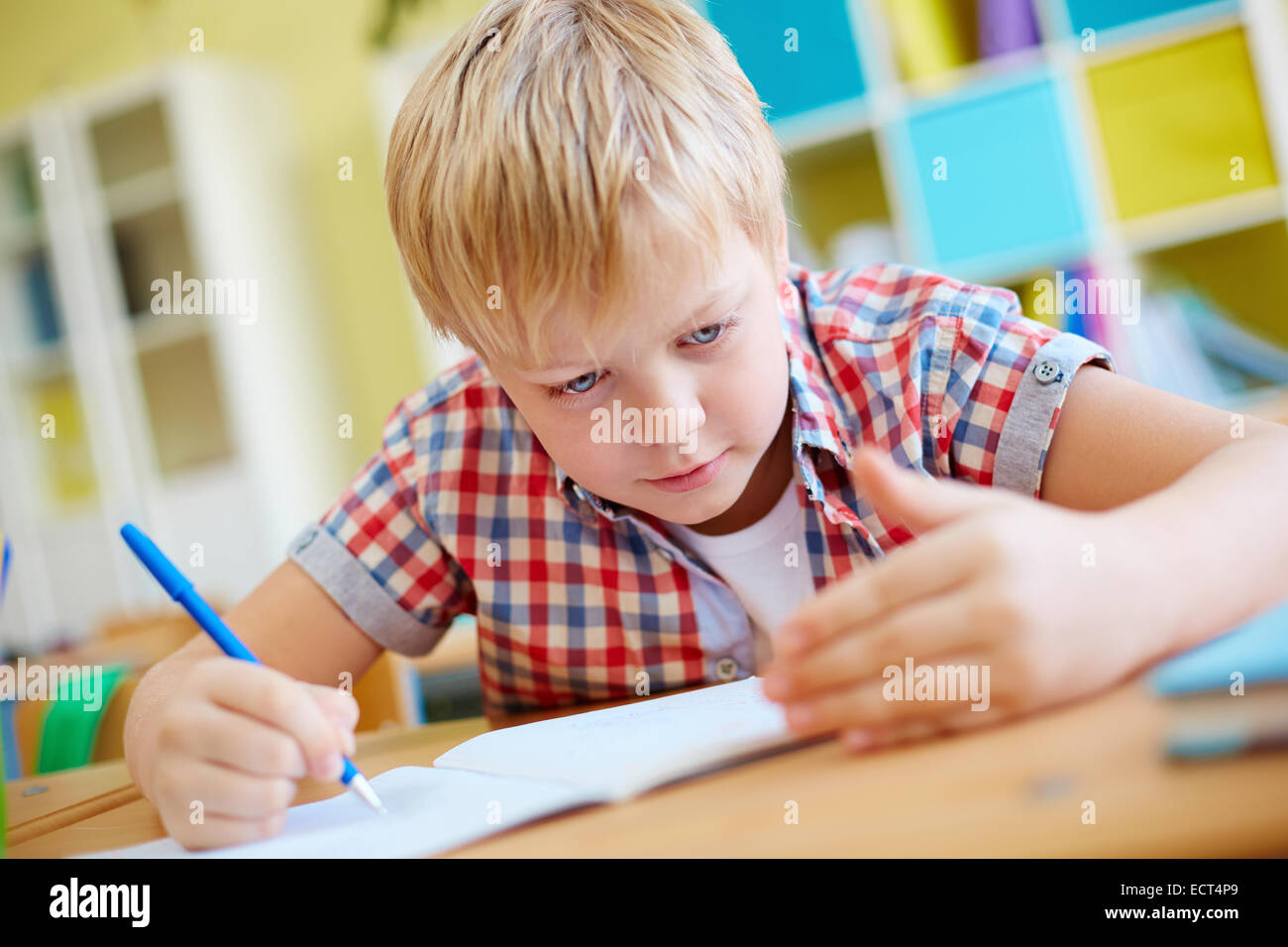 Boy cheating hi-res stock photography and images - Alamy