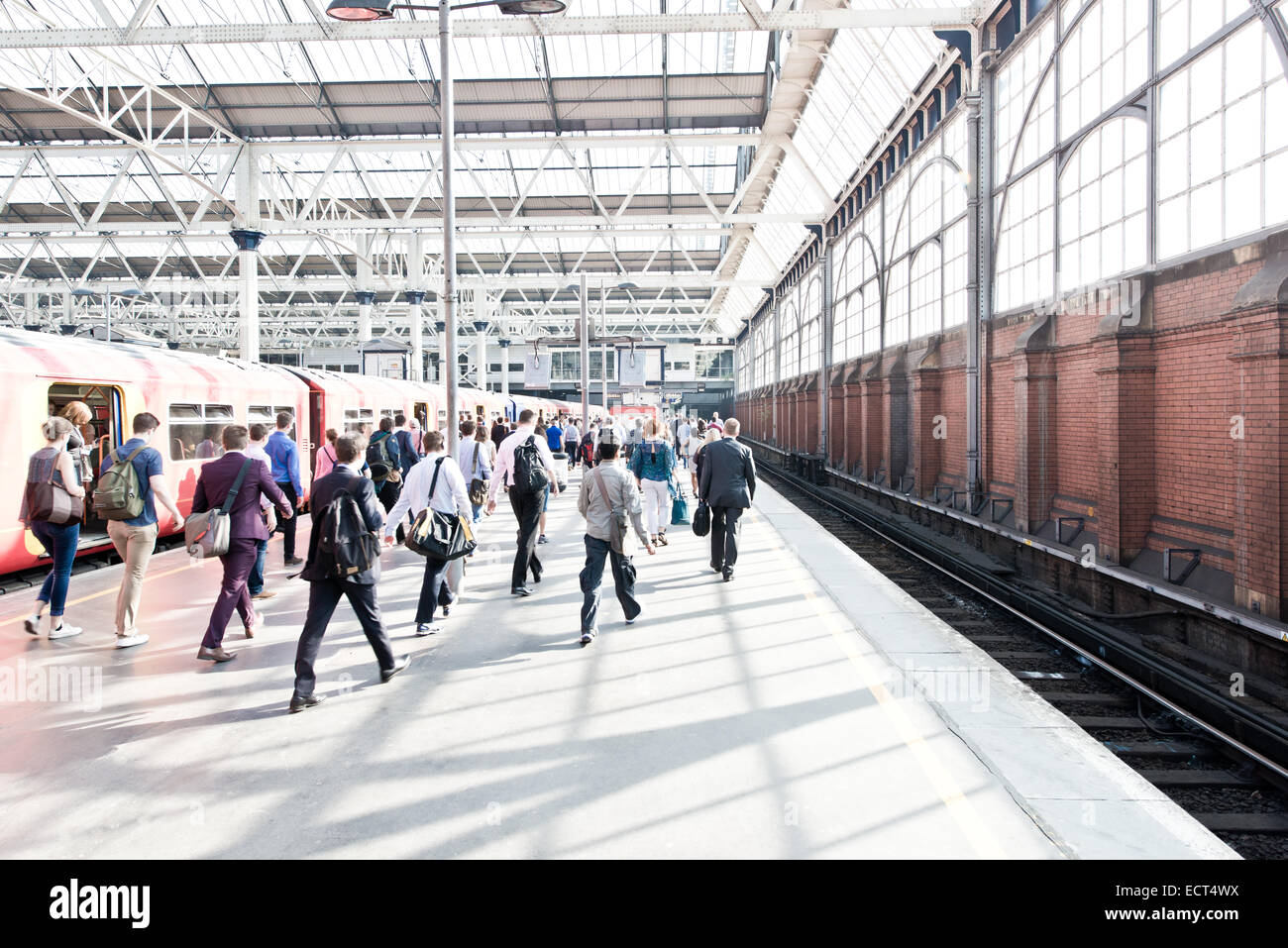 Commuter train leaving station hi-res stock photography and images - Alamy