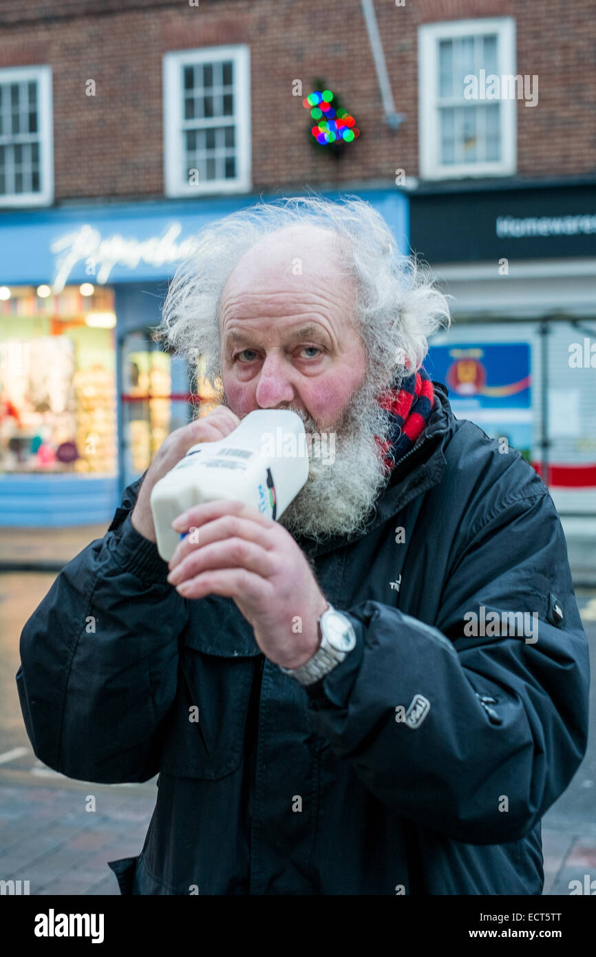 Homeless man drinking hi-res stock photography and images - Alamy