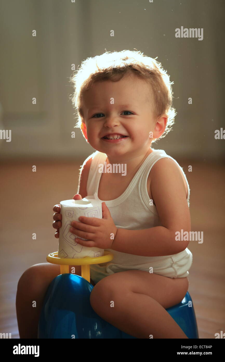 2 years old boy on his chamber pot Stock Photo - Alamy
