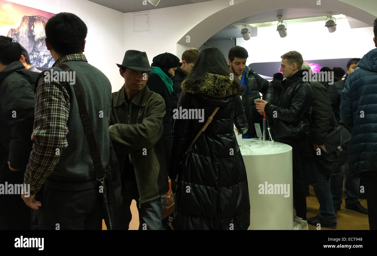 Moscow, Russia. 16th Dec, 2014. Shoppers check Apple products at an ...