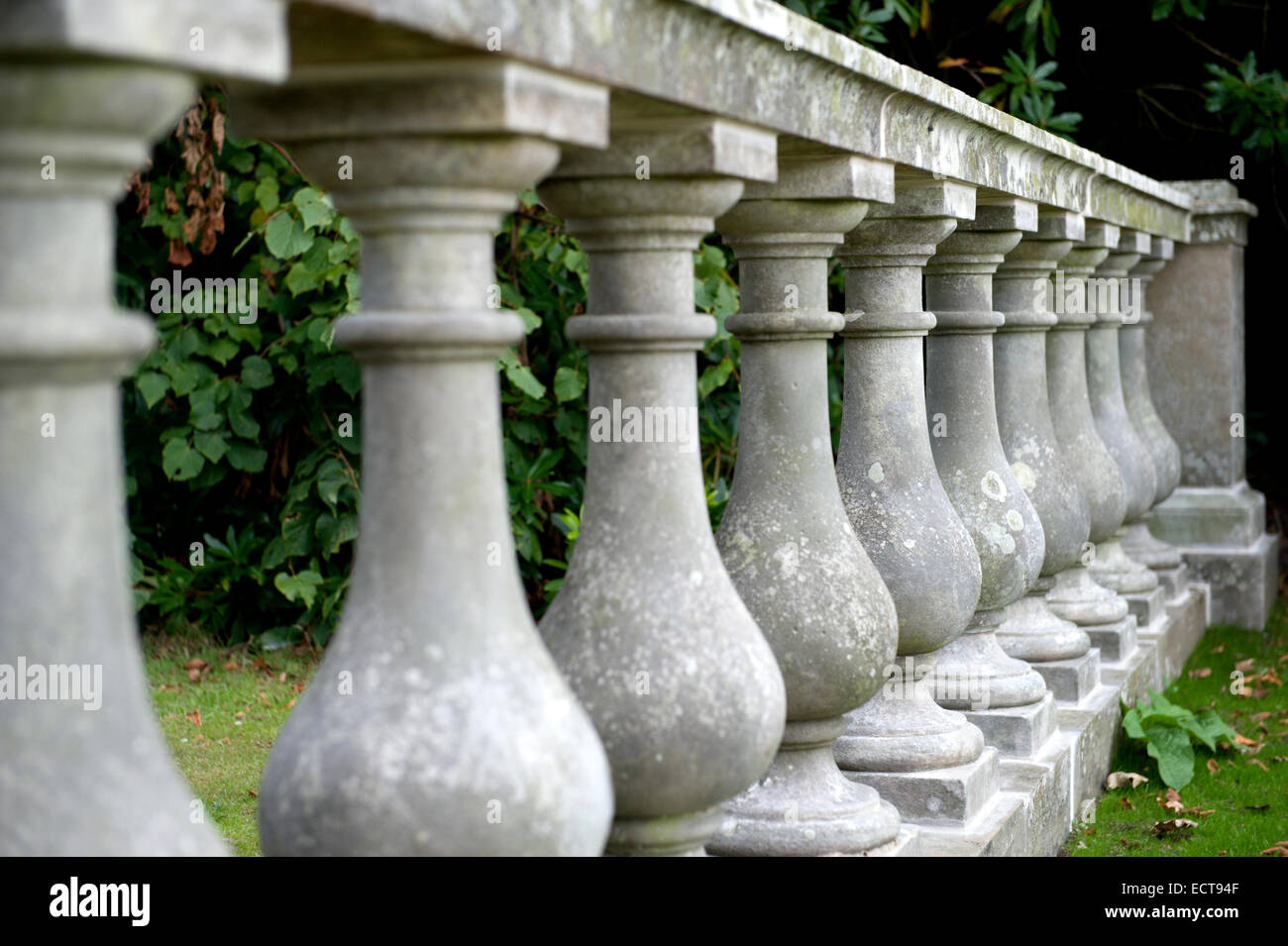 A wall created by using carved colonnette made up of shaped balusters ...