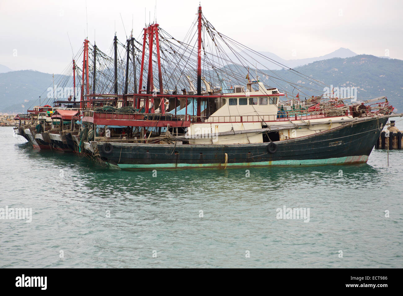 Fleet Of Commercial Fishing Boats Laid-Up On Cheung Chau Island, Hong ...