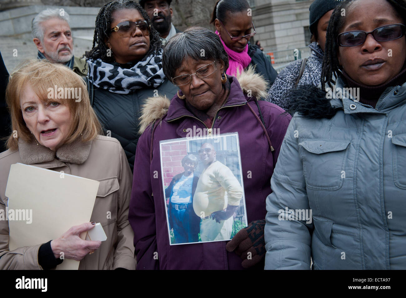 Manhattan, New York, USA. 18th Dec, 2014. Rebecca Singleton speaks as a ...