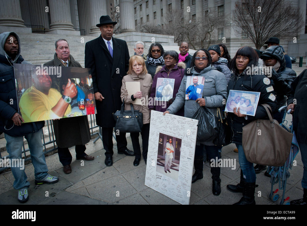 Manhattan, New York, USA. 18th Dec, 2014. Cousin Rudy Jenkins holds a ...