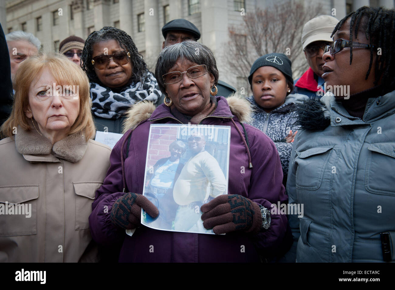 Manhattan, New York, USA. 18th Dec, 2014. Rebecca Singleton speaks as a ...