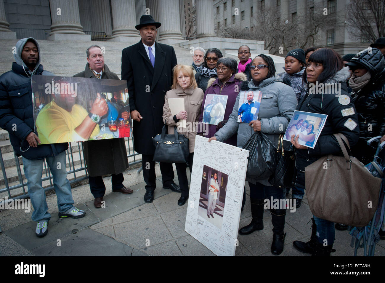 Manhattan, New York, USA. 18th Dec, 2014. Cousin Rudy Jenkins holds a ...