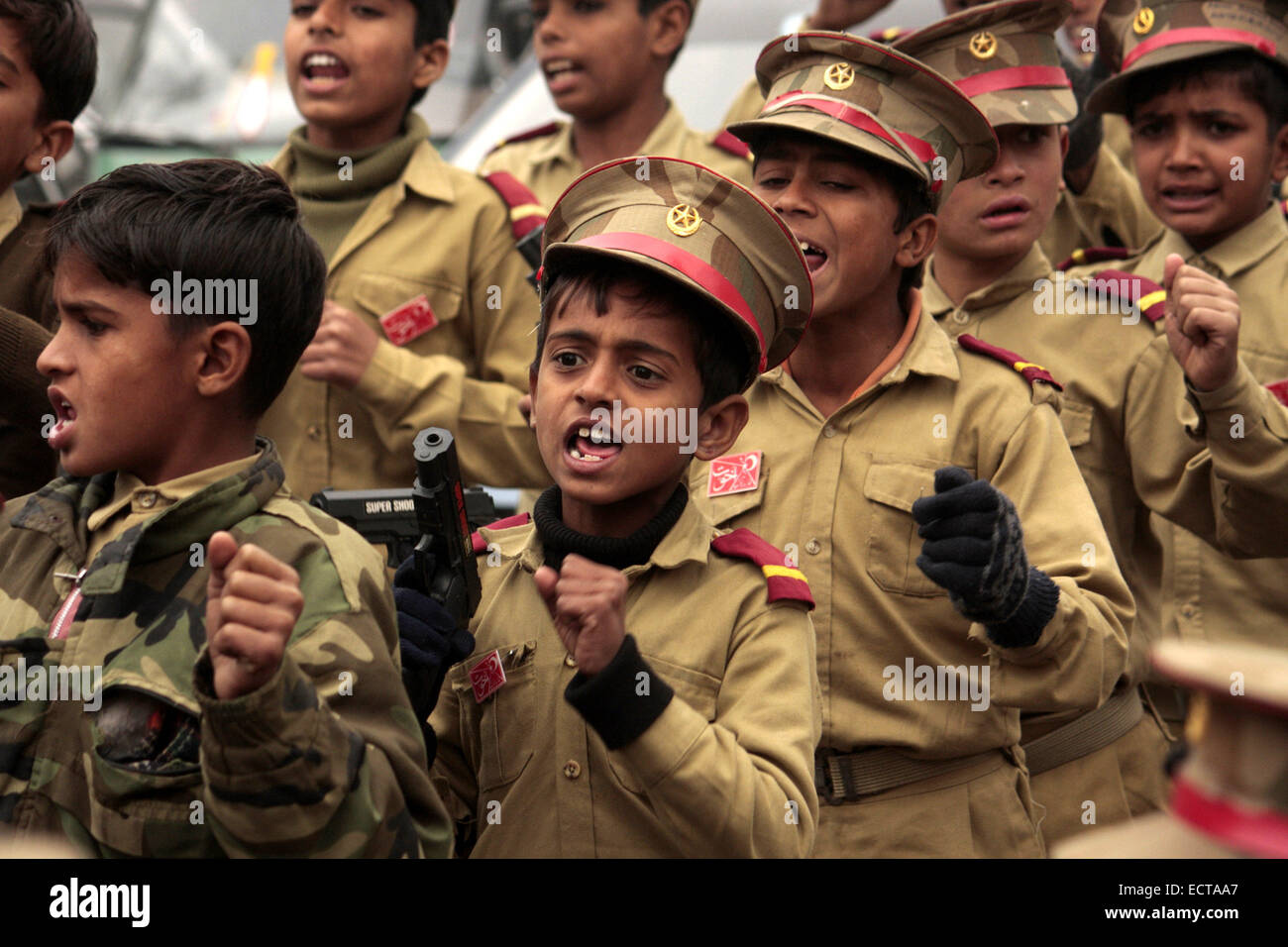 Lahore. 19th Dec, 2014. Pakistani children in army uniform attend a ...