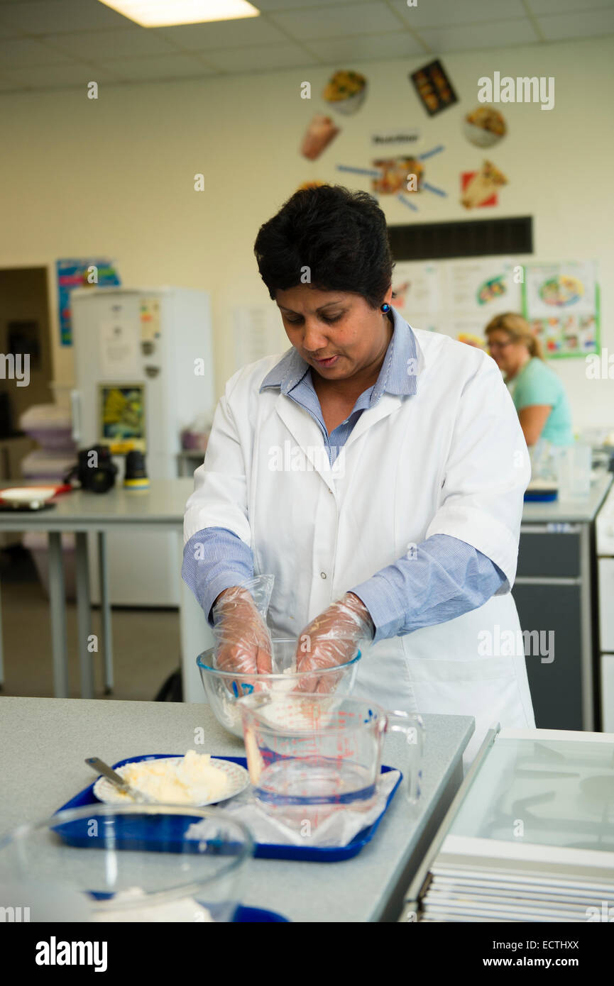 Secondary school education Wales UK: A woman teacher demonstrating the ...