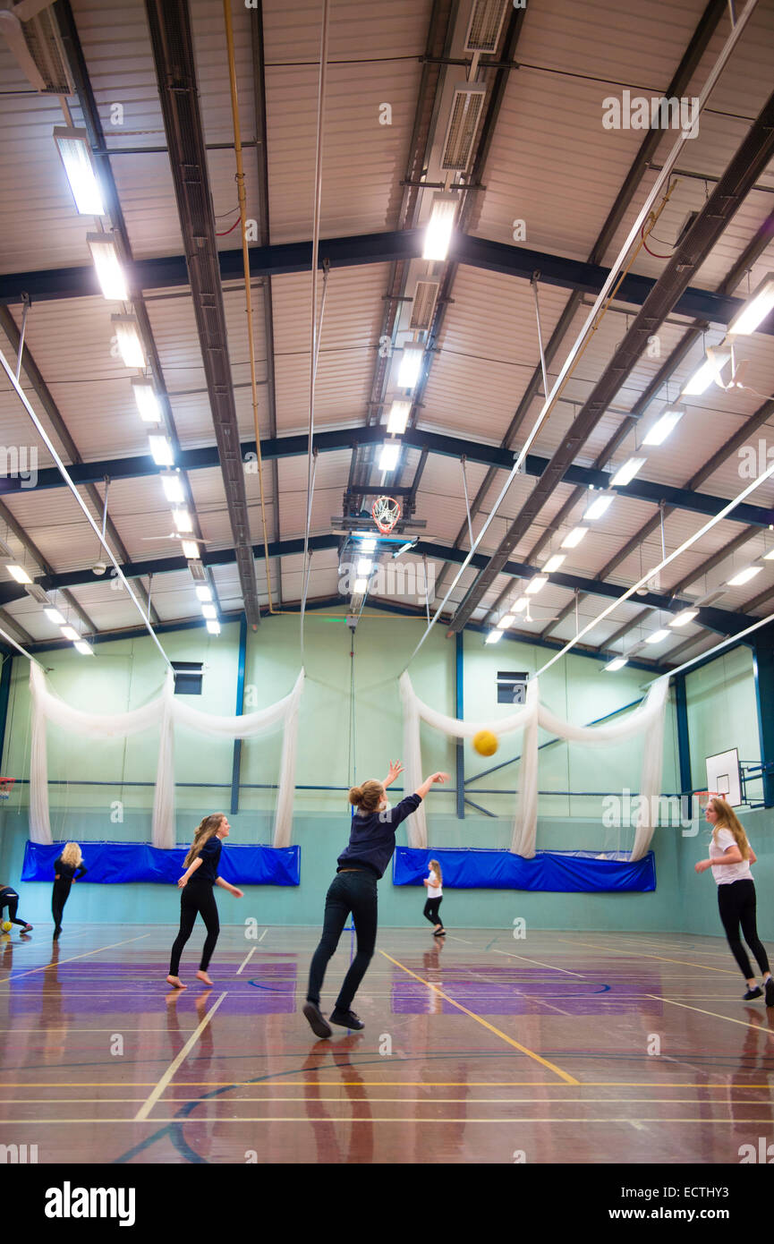 Secondary school physical education Wales UK: teenage girls playing a ...