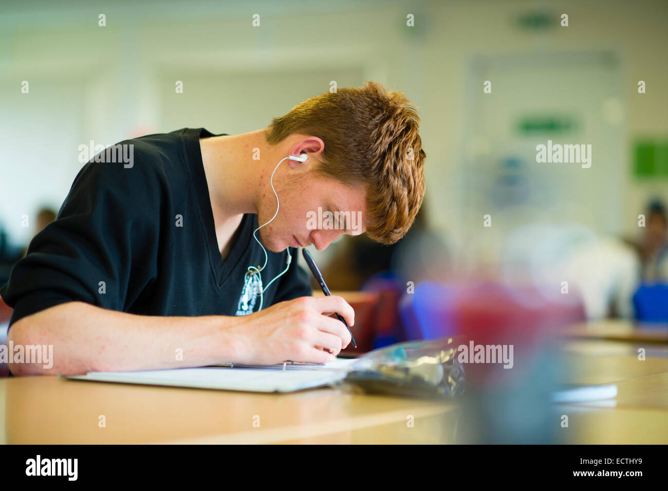 Pupils doing homework in a classroom hi-res stock photography and ...