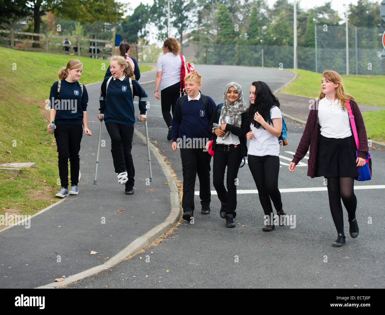 Secondary education Wales UK - school children outdoors on the campus ...