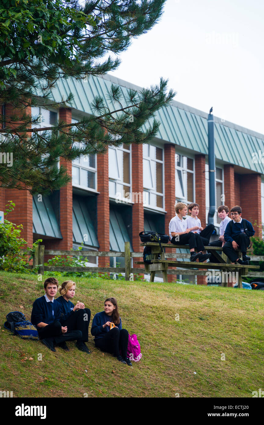 Secondary education Wales UK - school children sitting and talking ...