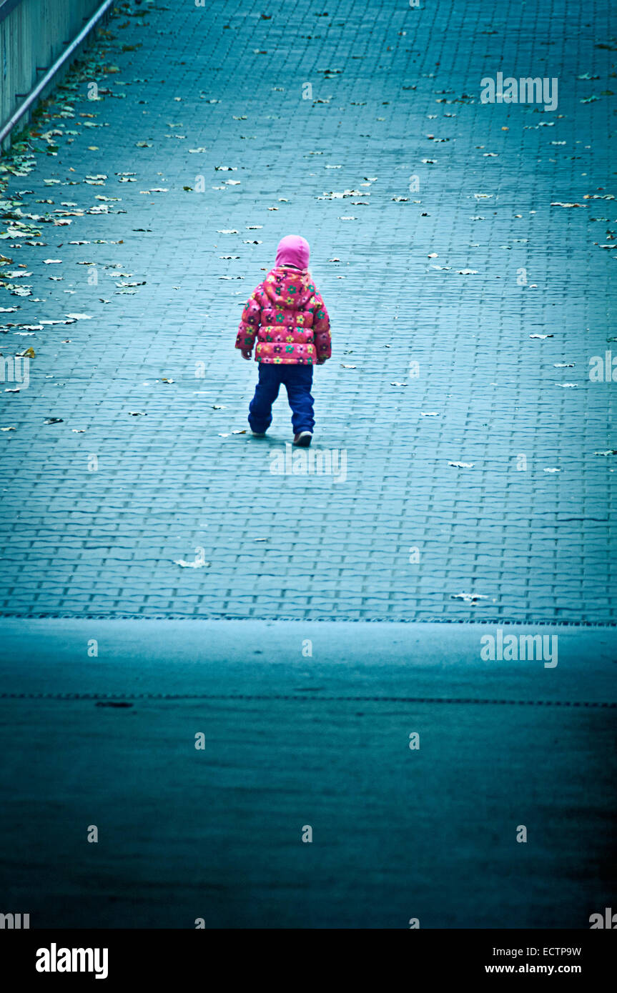 small child walking alone Stock Photo - Alamy