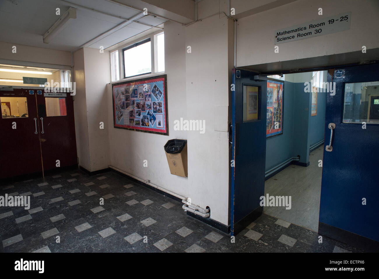 A drab corridor in Teddington School, a run-down state school building ...