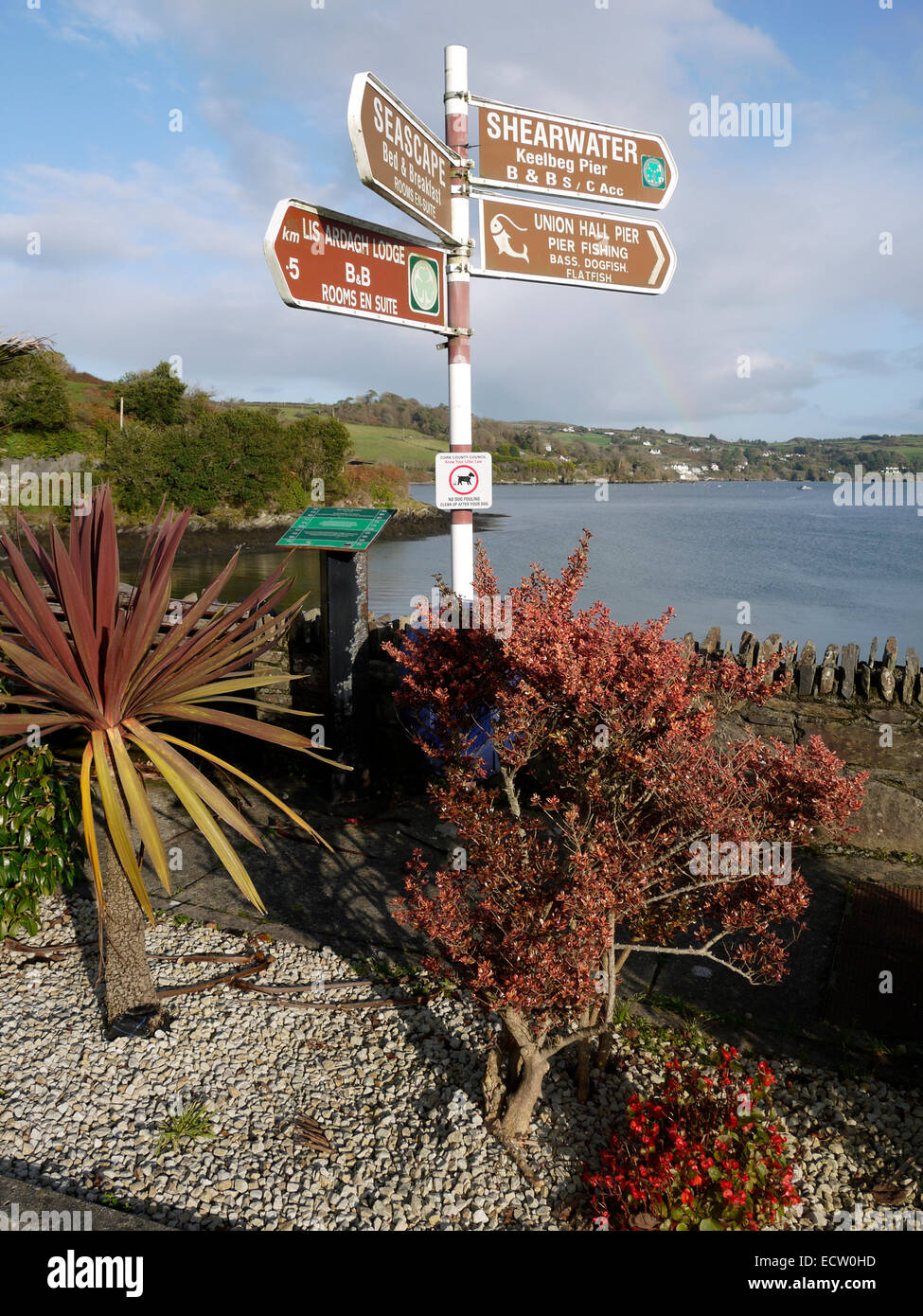 Signpost pointing to tourist attractions at Unionhall, Glandore harbour ...