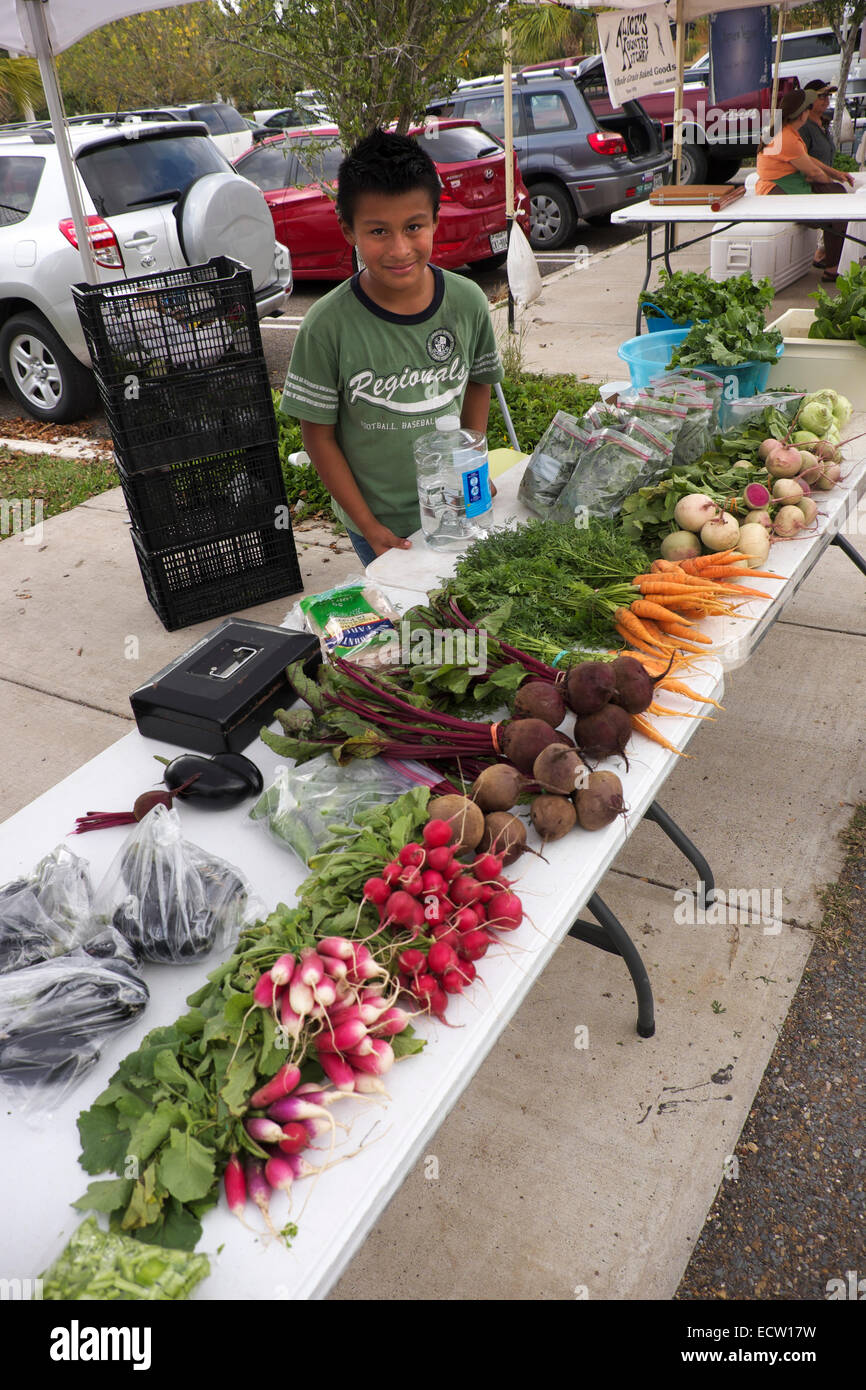 Hispanic boy poses for the camera at the Farmer's Market in Brownsville ...