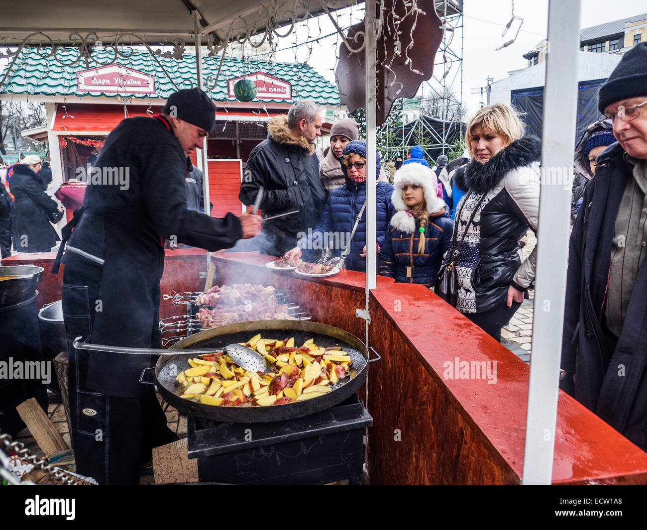 Kiev, Ukraine. 19th Dec, 2014. Chefs cook street food -- Christmas ...