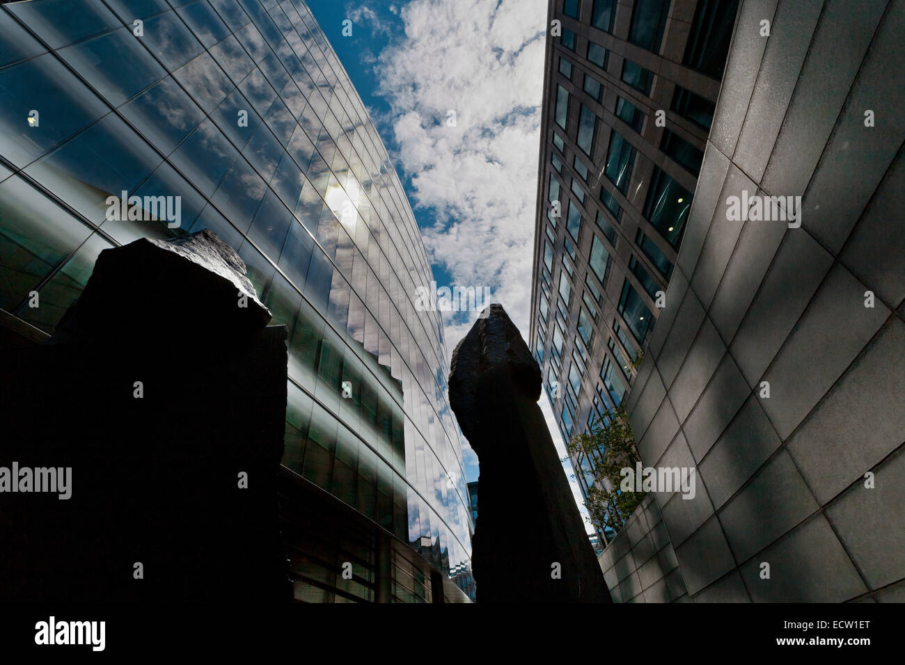 Statue and buildings with reflections in the City of London, UK Stock ...