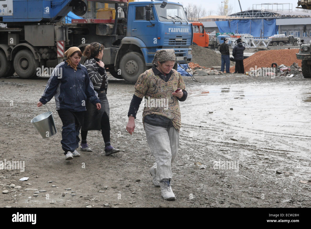Workers at the construction site of the 'Akhmat Arena' sports stadium ...