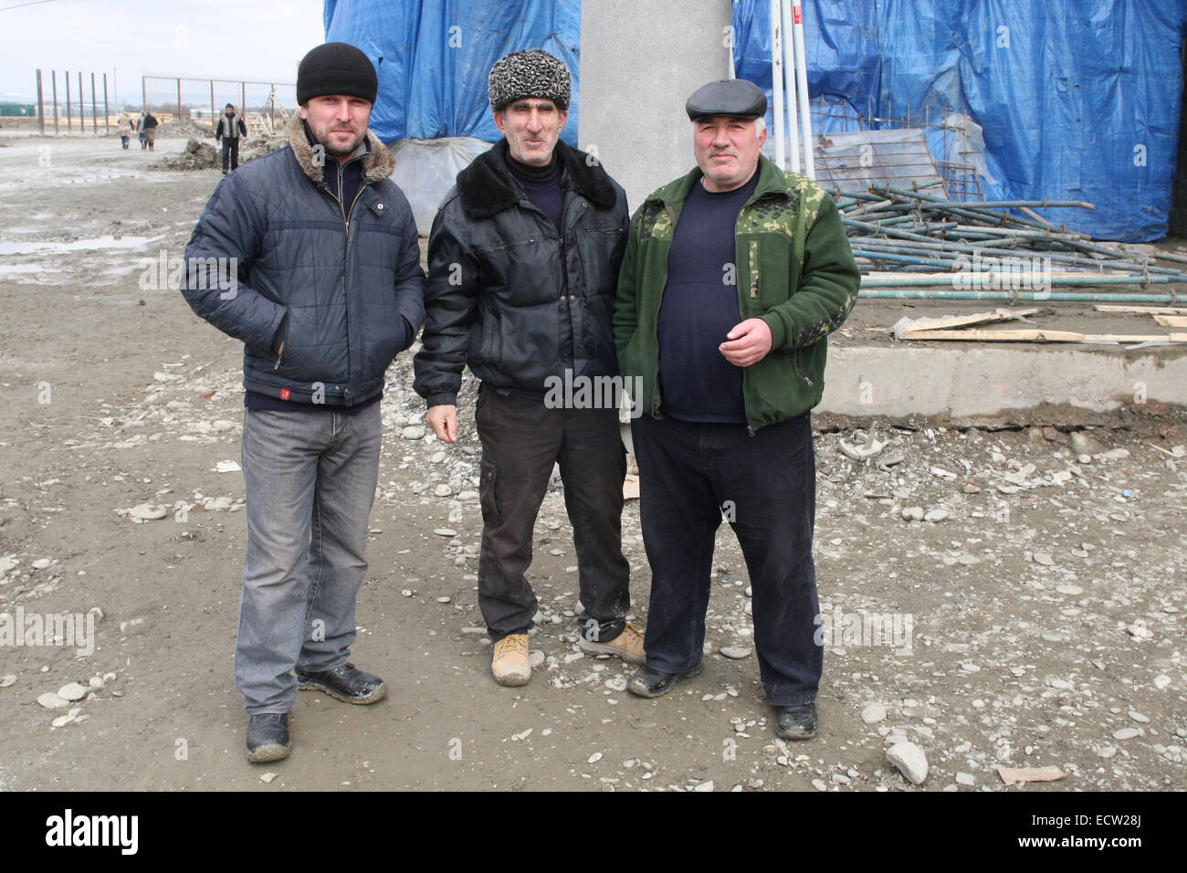 Workers at the construction site of the 'Akhmat Arena' sports stadium ...