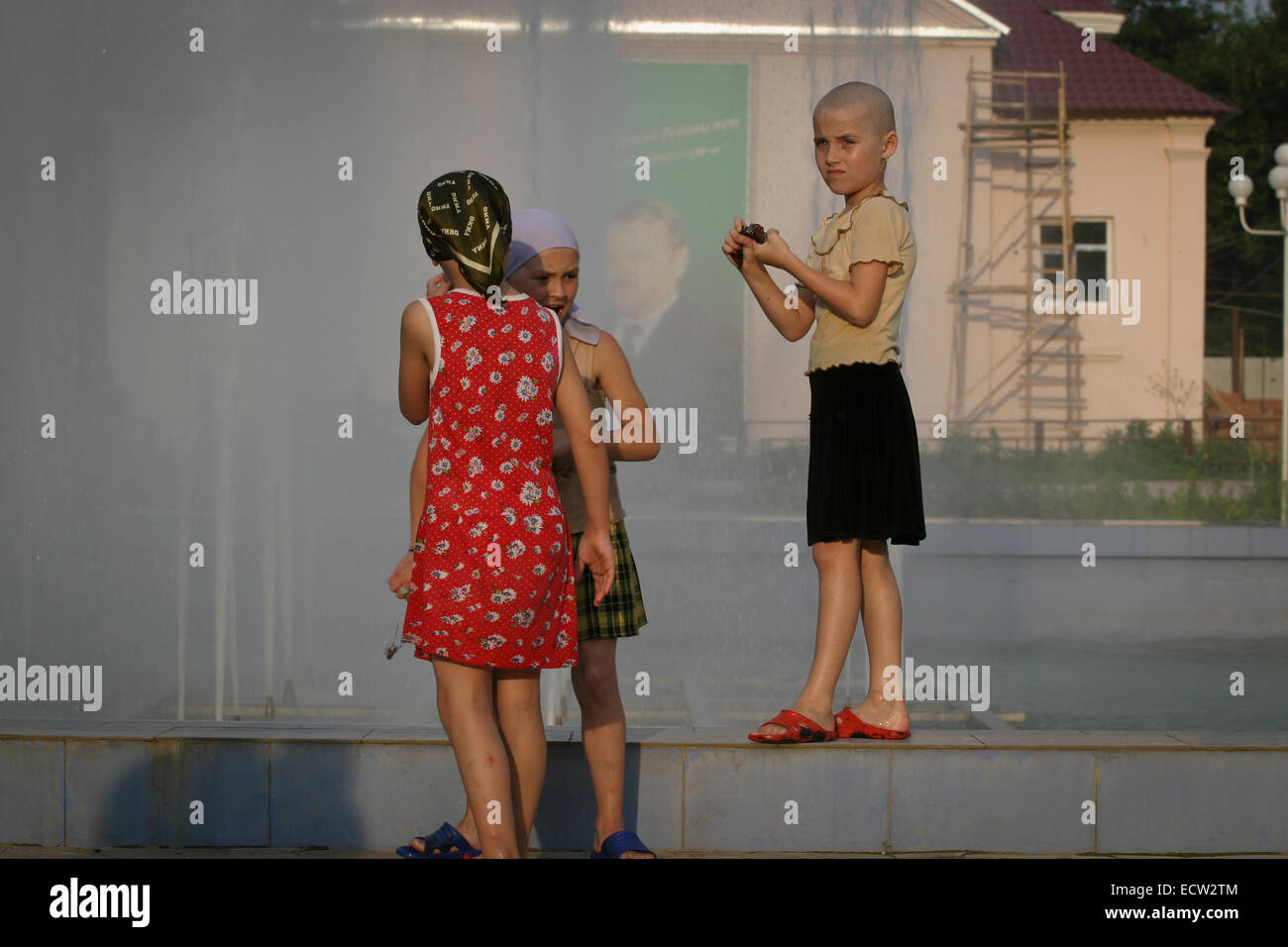 Girls enjoying the summer heat in Gudermes, Chechnya, Russia Stock ...