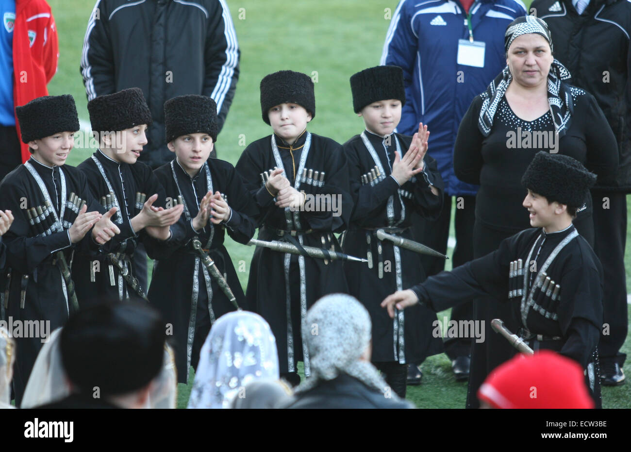 Members of the Chechen childrens' dance group Bashlam getting ready for ...