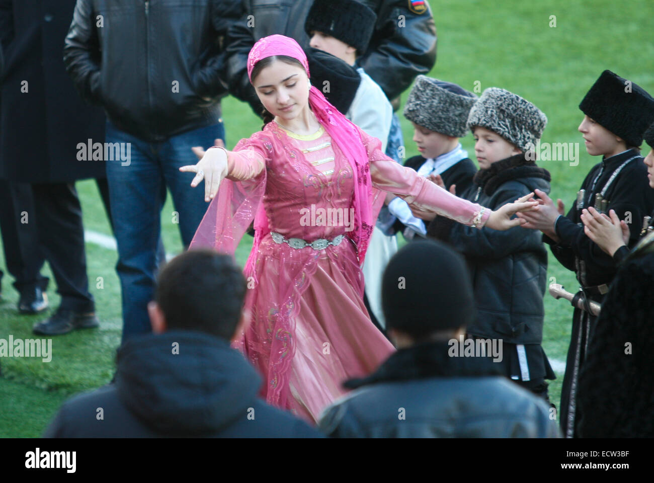 Members of the Chechen childrens' dance group Bashlam getting ready for ...