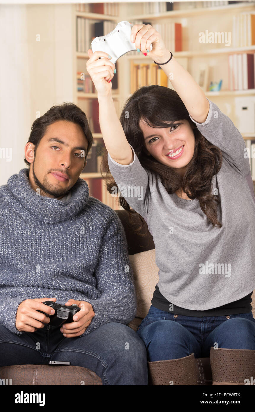 young cute couple playing video games Stock Photo - Alamy