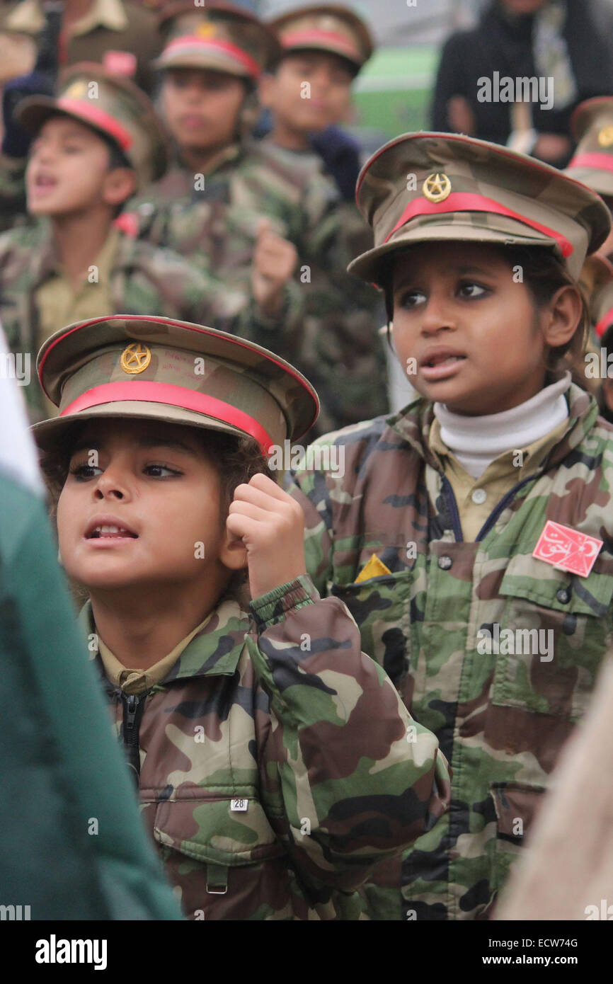 Lahore, Pakistan. 19th Dec, 2014. Pakistani students in army uniform ...