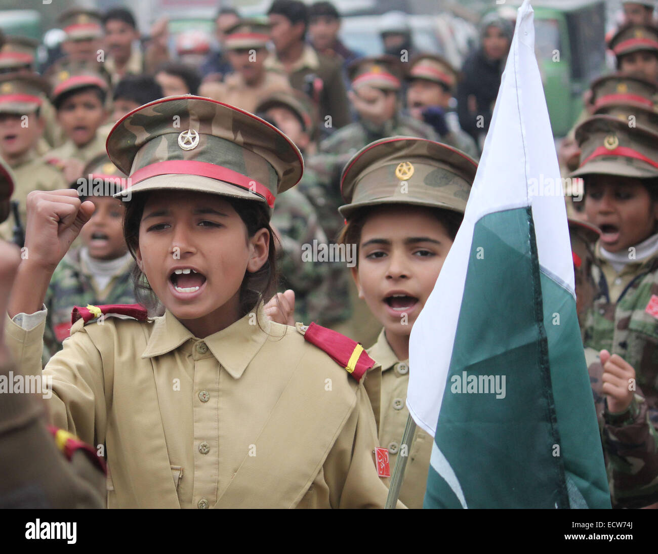 Lahore, Pakistan. 19th Dec, 2014. Pakistani students in army uniform ...