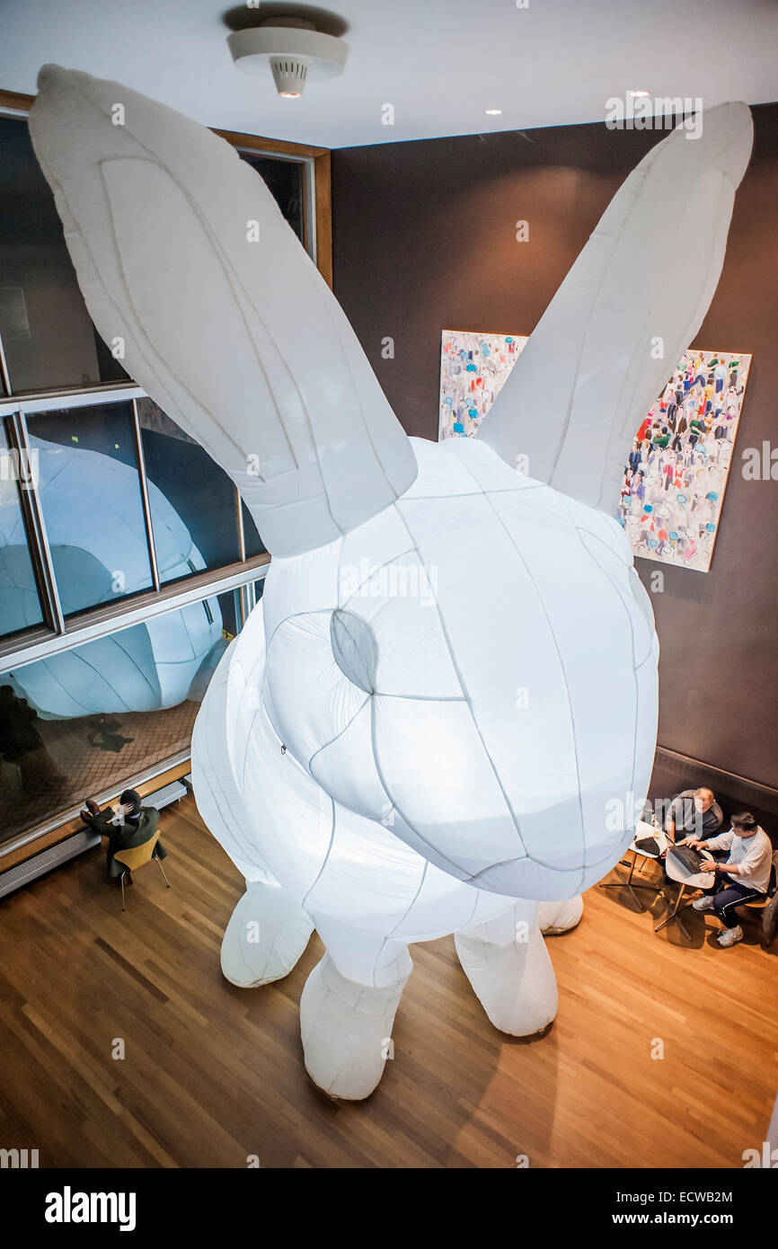 London, UK. 18th Dec, 2014. Giant illuminated rabbits occupy the ...