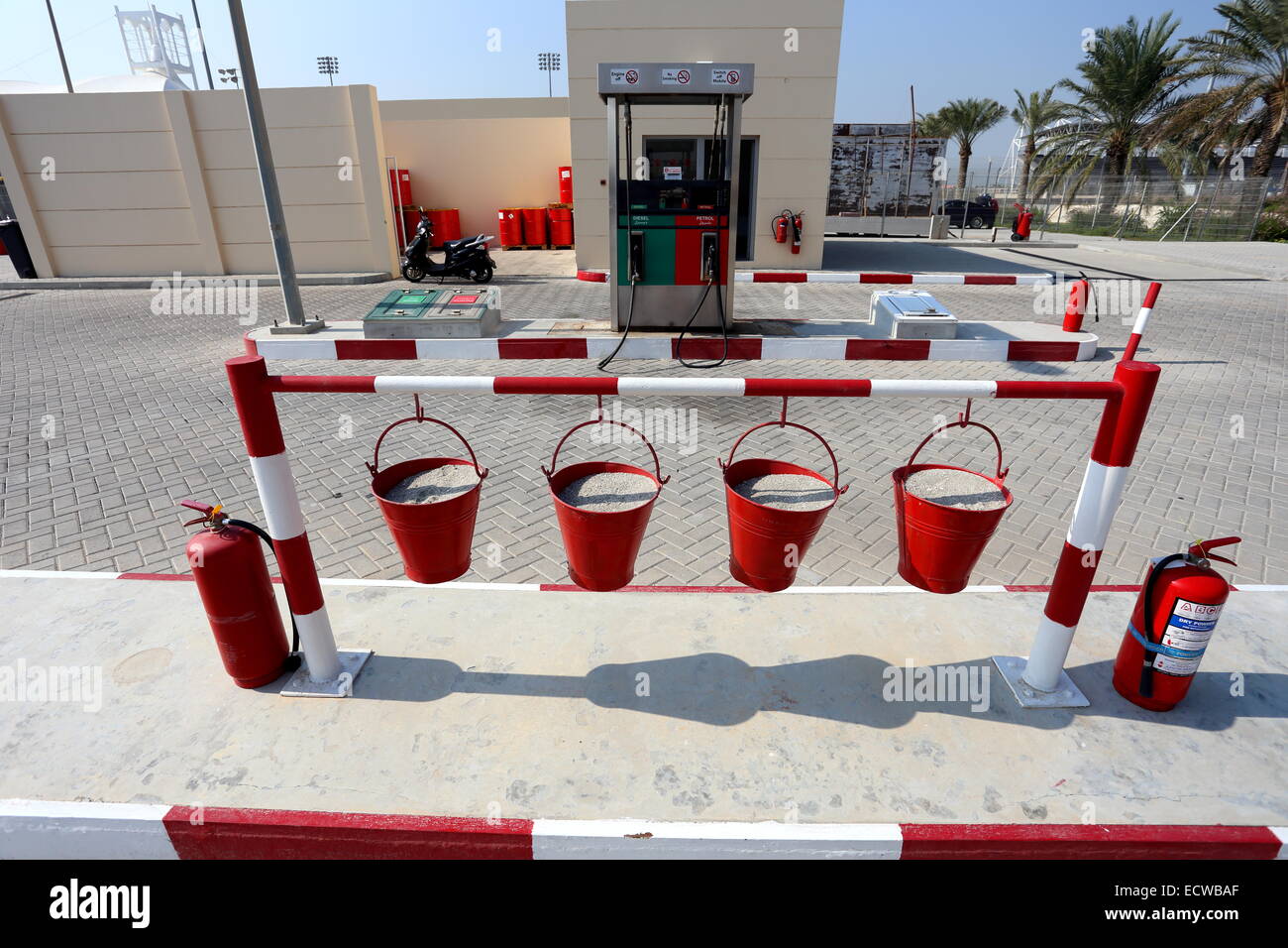 Red fire buckets at a petrol station at the Formula 1 circuit, Sakhir ...