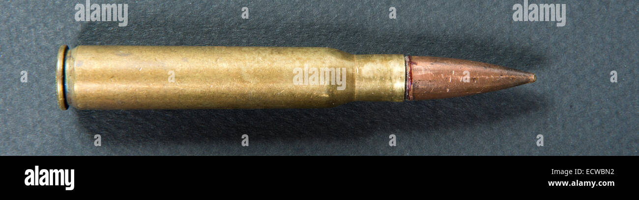 military bullet placed on a black fabric Stock Photo - Alamy