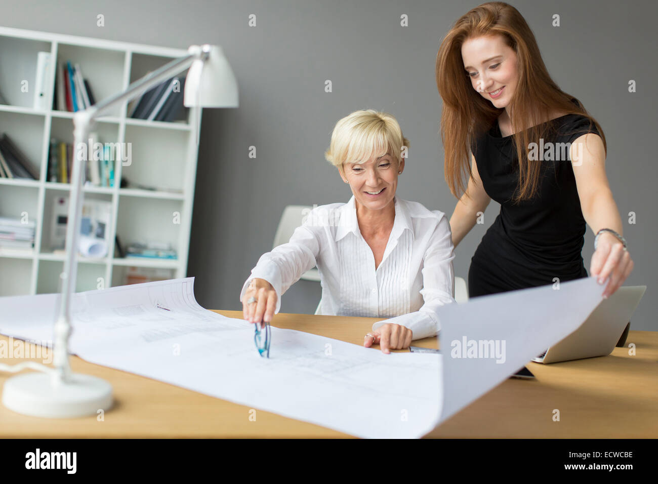 Women working in the office Stock Photo - Alamy