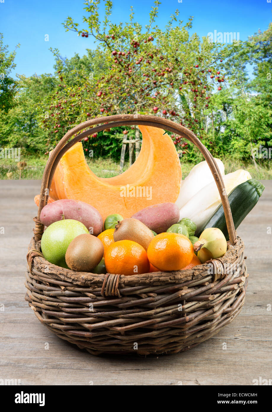 basket of fruit and vegetables in an orchard Stock Photo - Alamy