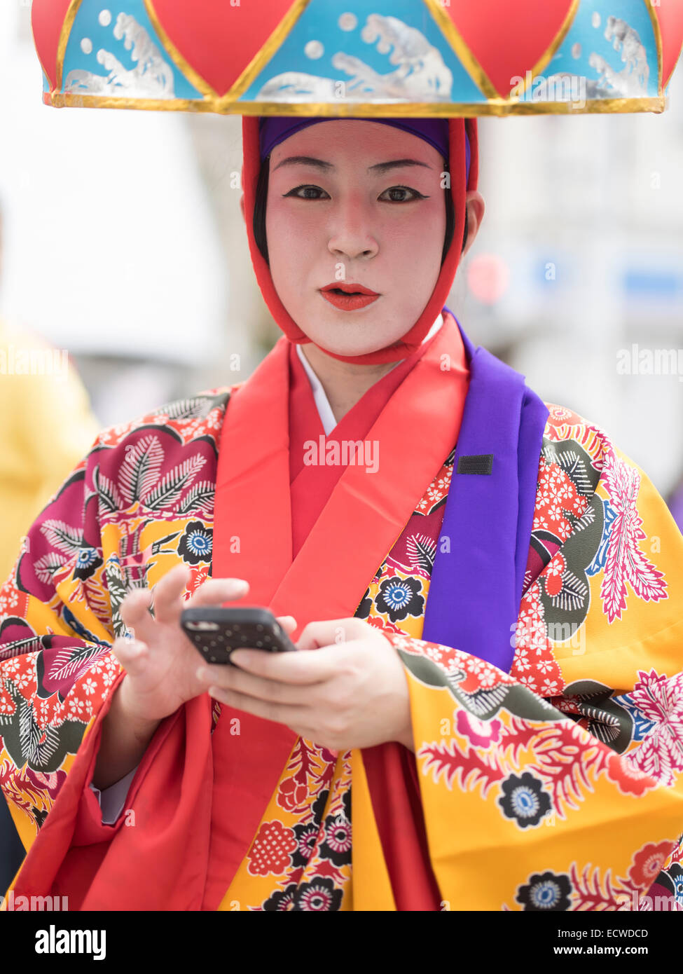 Woman in traditional ryukyu dance costume with Hanagasa hat using ...