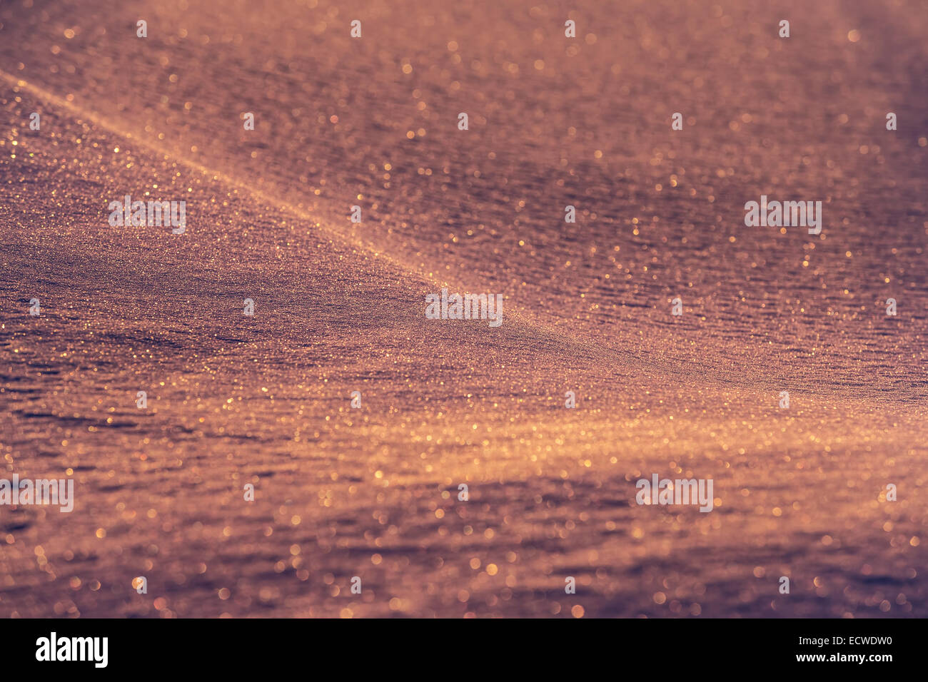Abstract snow background, beautiful snowy hills in mild sunset light ...