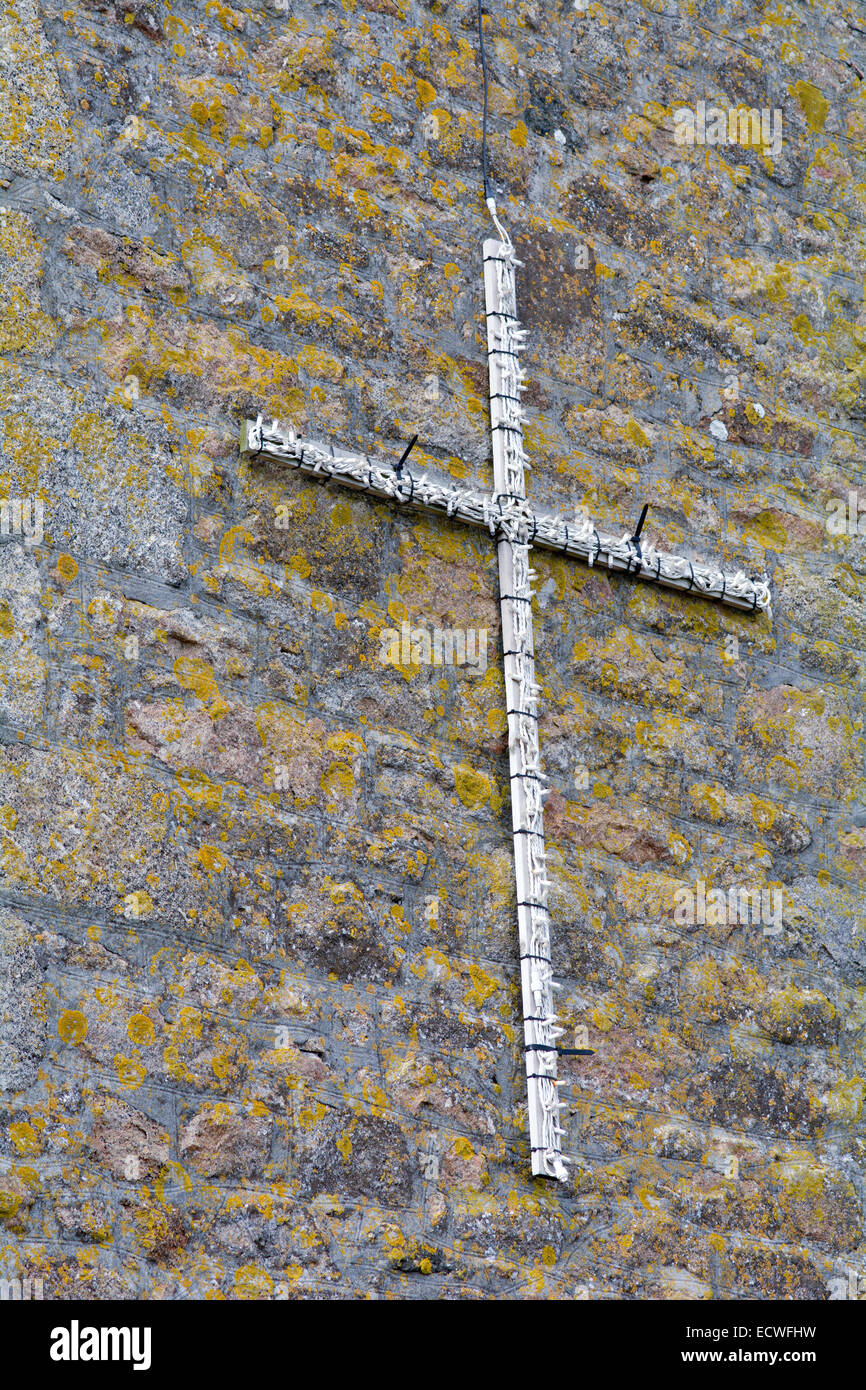 Cross on church wall Stock Photo - Alamy