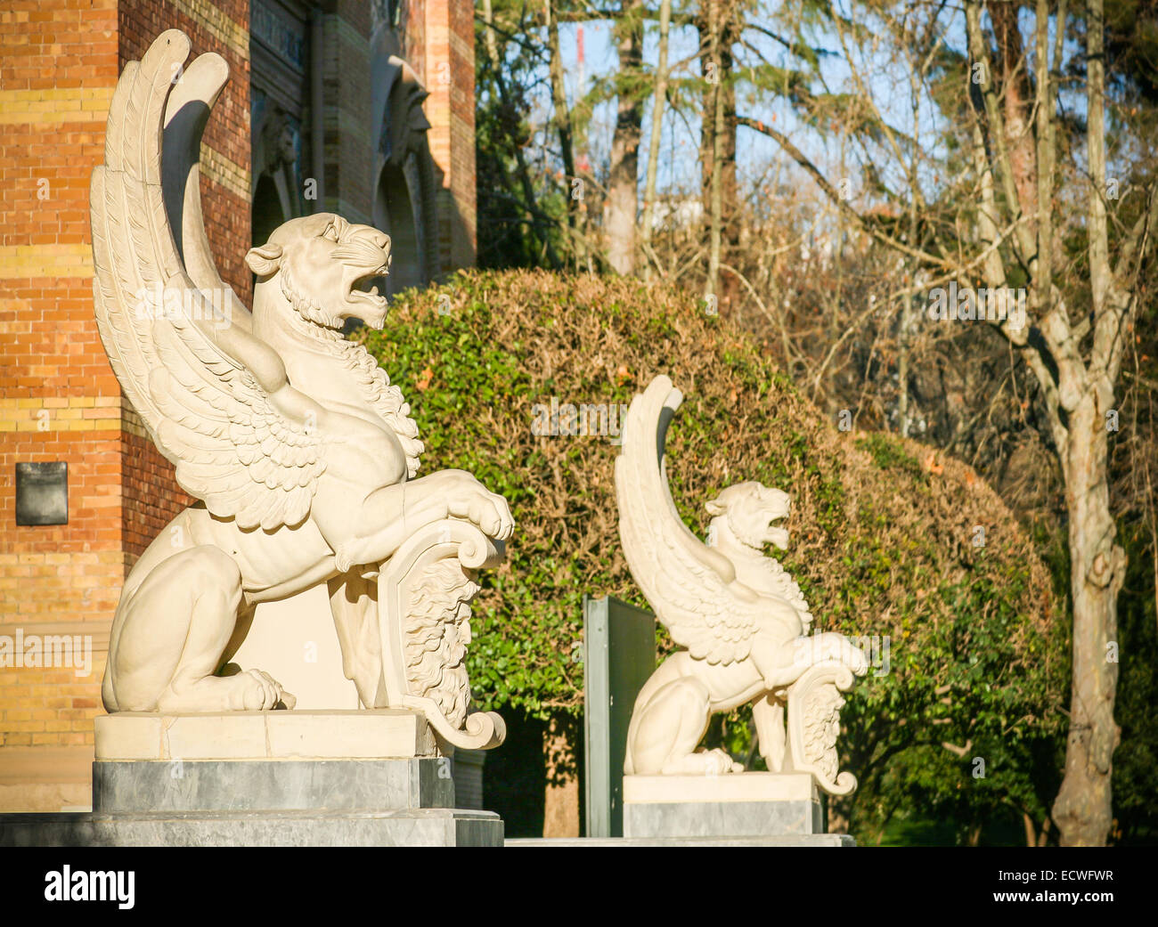 Statue of Winged tigers in city park in Madrid Stock Photo - Alamy