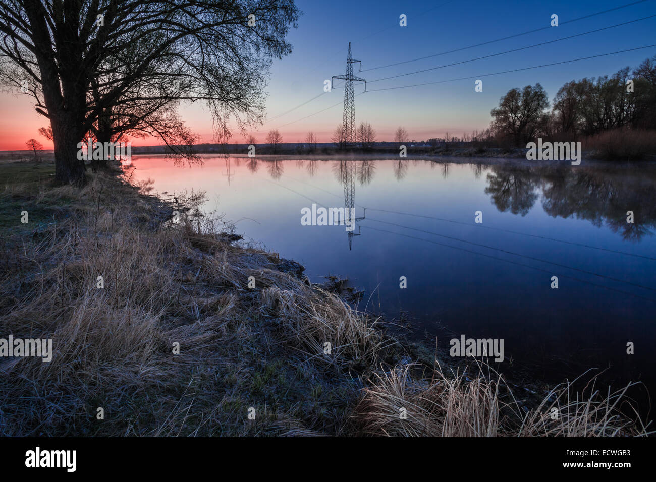 Landscape with Power Line on sunset, sunrise Stock Photo - Alamy