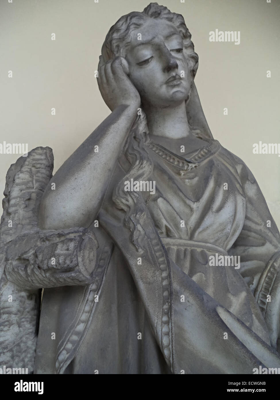 Statue of woman on tomb as a symbol of depression pain sorrow and death ...